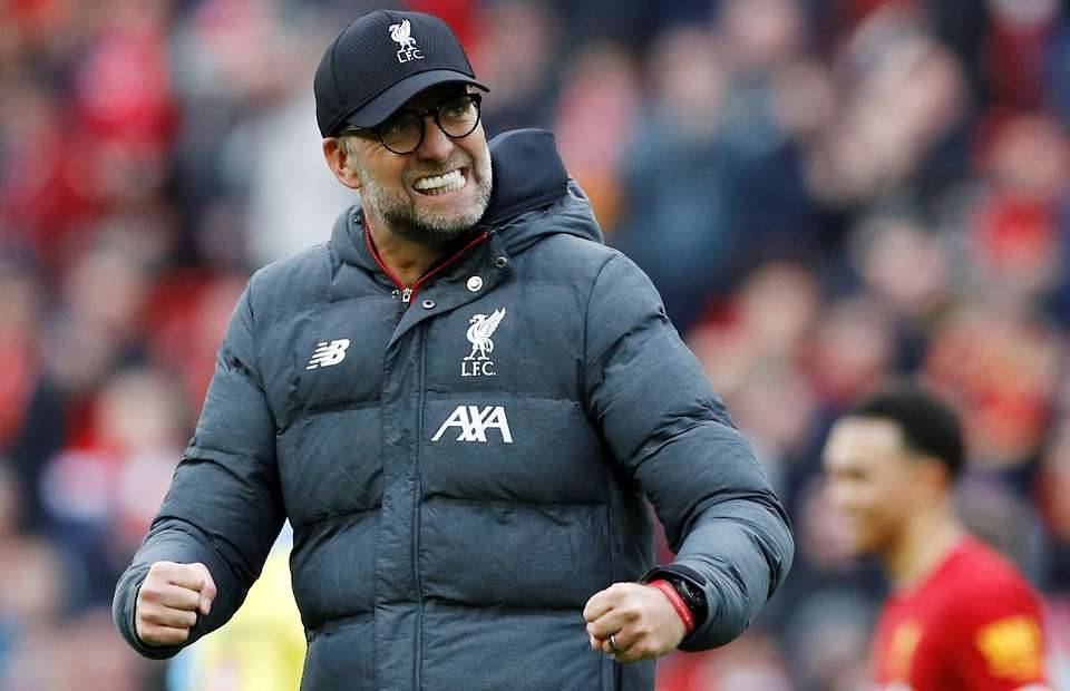 Jurgen Klopp fights back tears during interview after Liverpool crowned ...