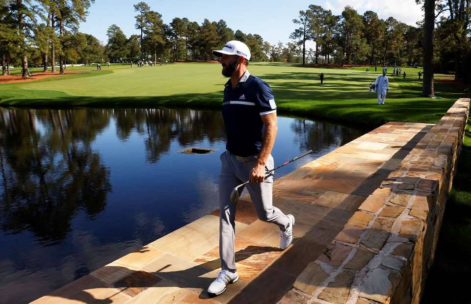 The Masters: Dustin Johnson shares lead as Tiger Woods holds steady and ...