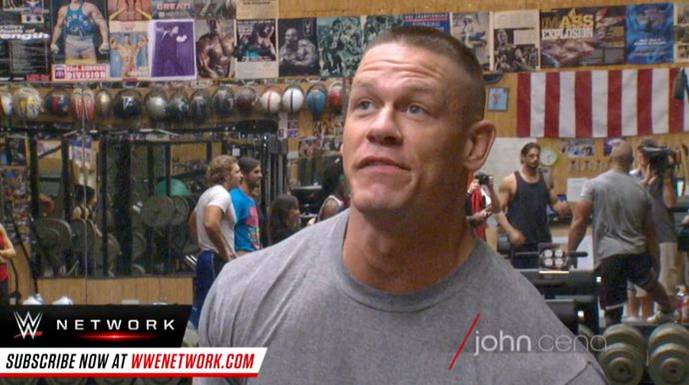Video of WWE star Big E breaking bench press record at John Cena's gym