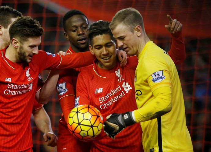 Joe Hart fighting for the ball with Liverpool's Roberto Firmino is ...