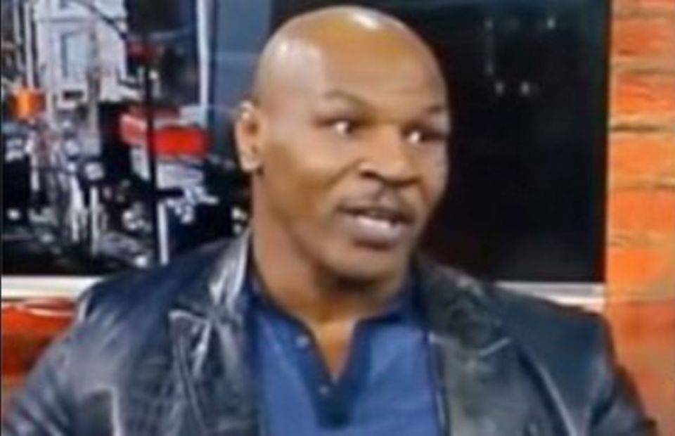 Mike Tyson destroying a reporter during live TV interview