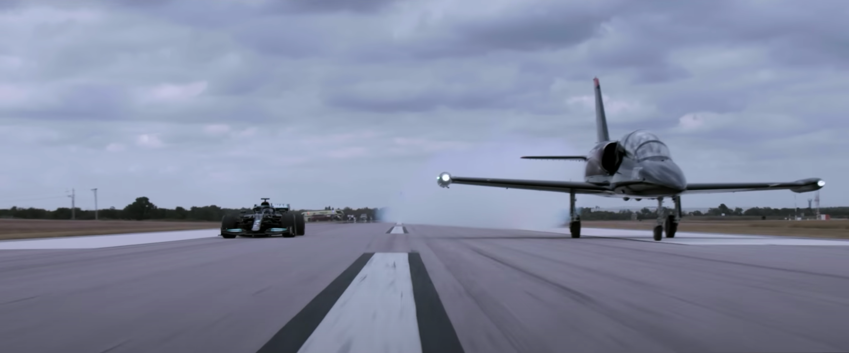 Lewis Hamilton's Mercedes F1 car vs a jet: Incredible video of race