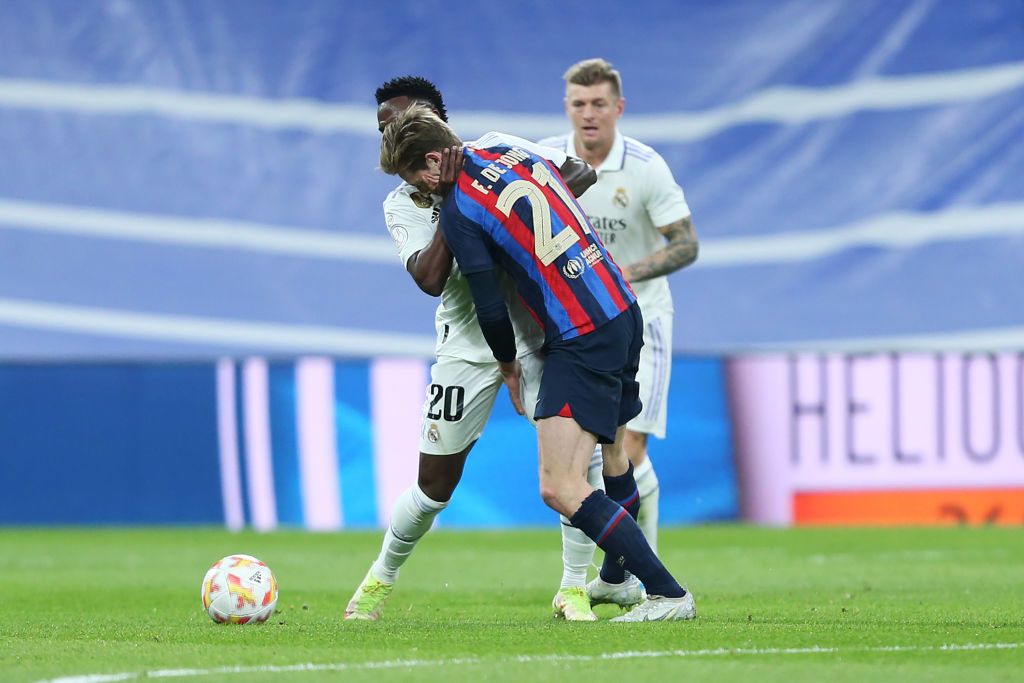 Vinicius Jr vs Frenkie De Jong: Real Madrid man floors Barca ace in ...