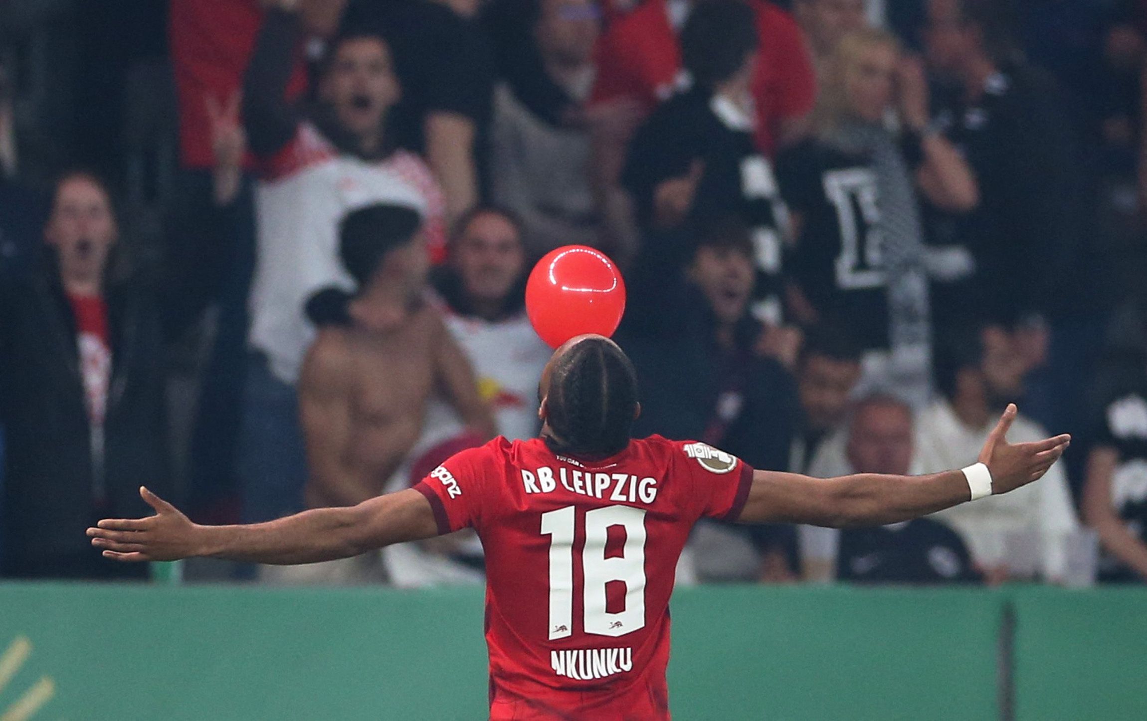 Why does Chelsea's Christopher Nkunku celebrate with a balloon?