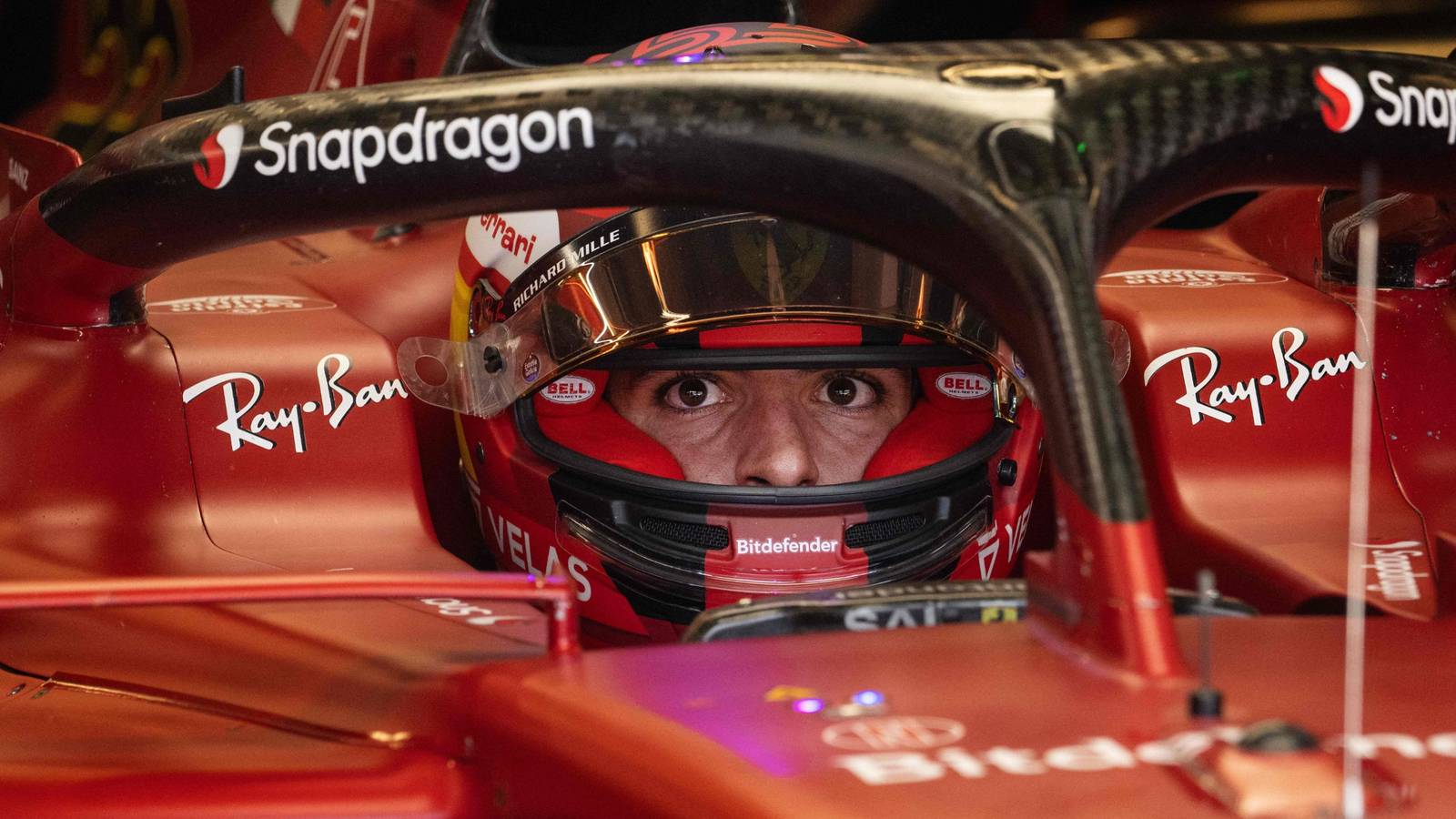 How do F1 drivers sit?