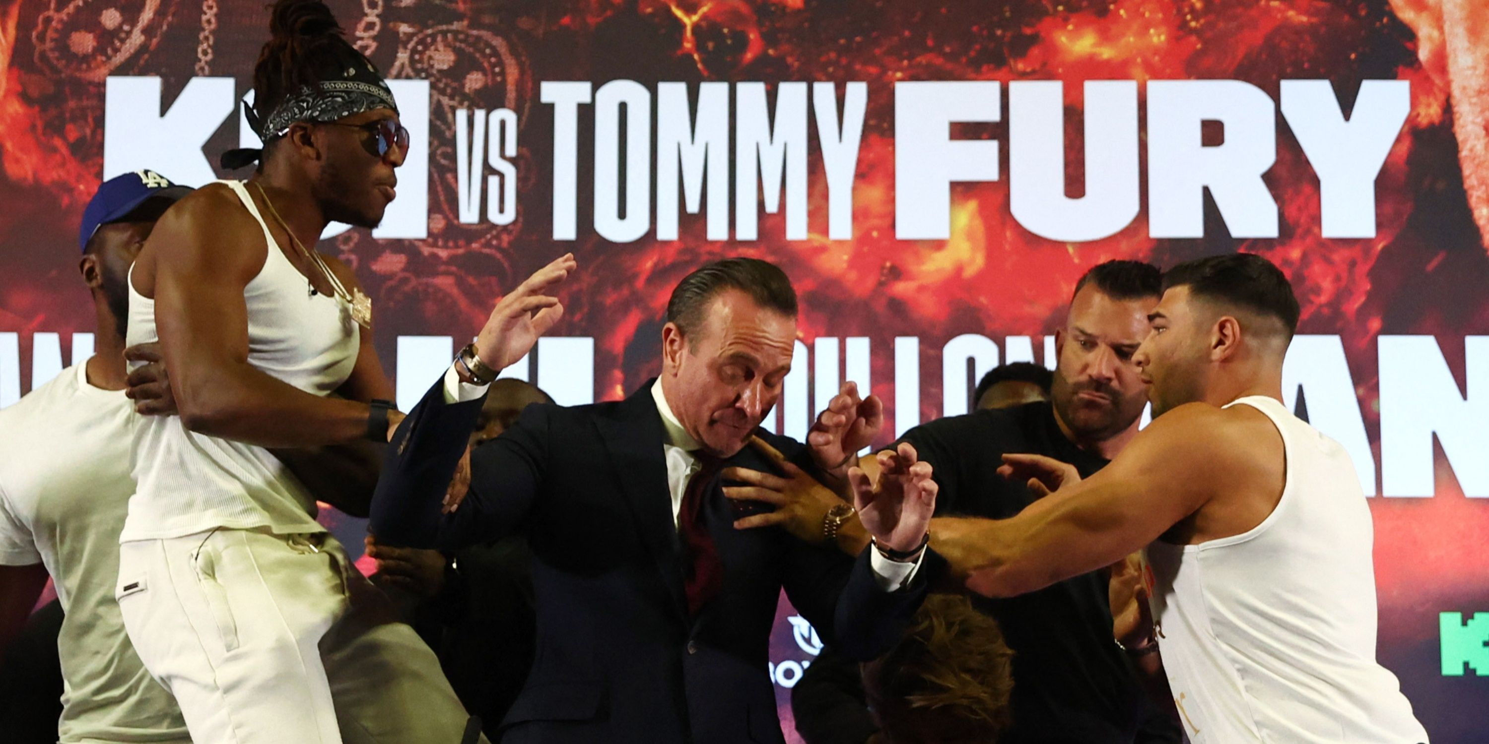 KSI and Tommy Fury strip and compare huge physiques in new face-off