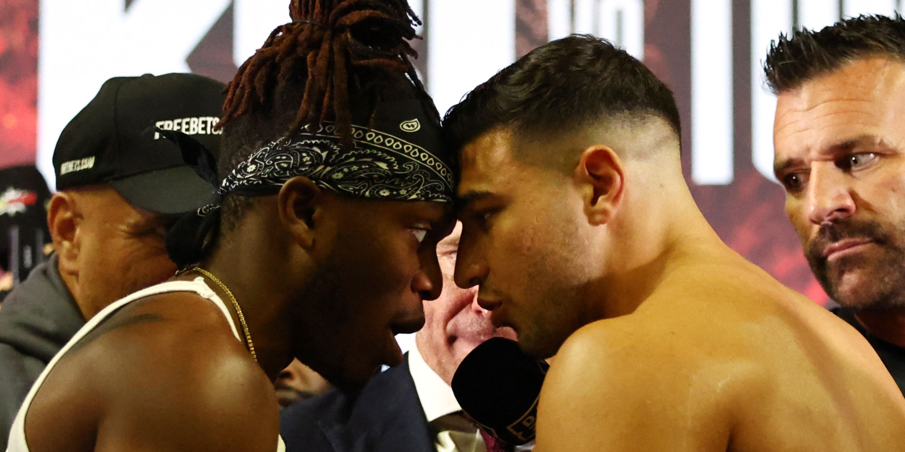 KSI and Tommy Fury strip and compare huge physiques in new face-off