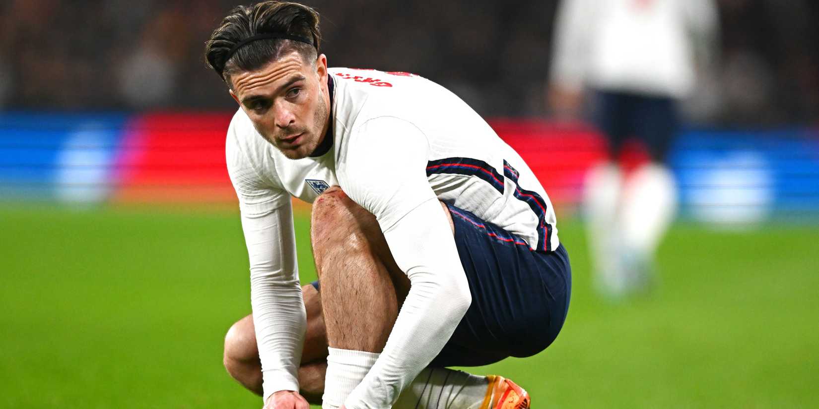 Why Jack Grealish Wears Socks Low and Tiny Shin Pads