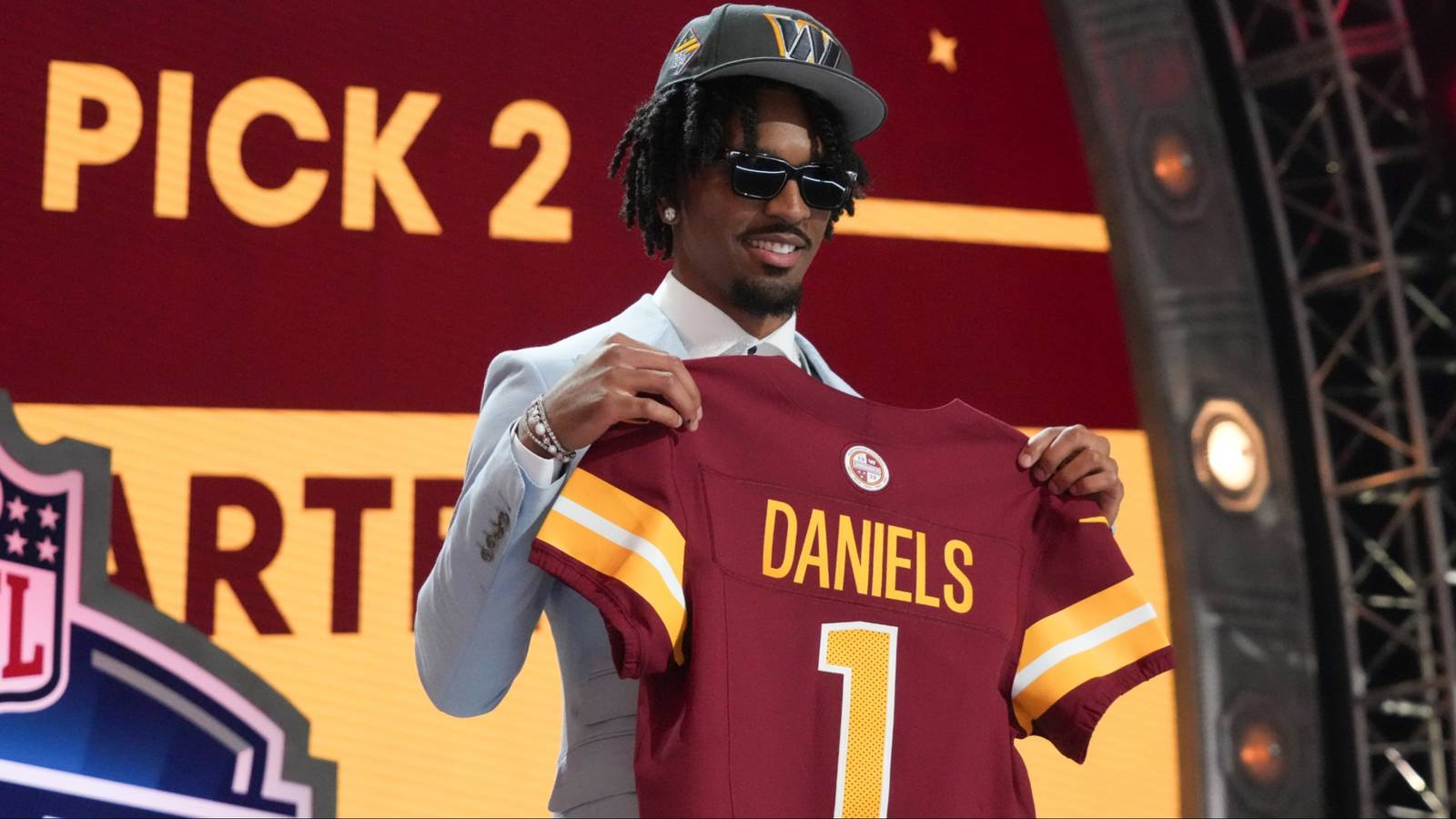 Dan Quinn Impressed With Jayden Daniels' 'Urgency & Work Ethic'