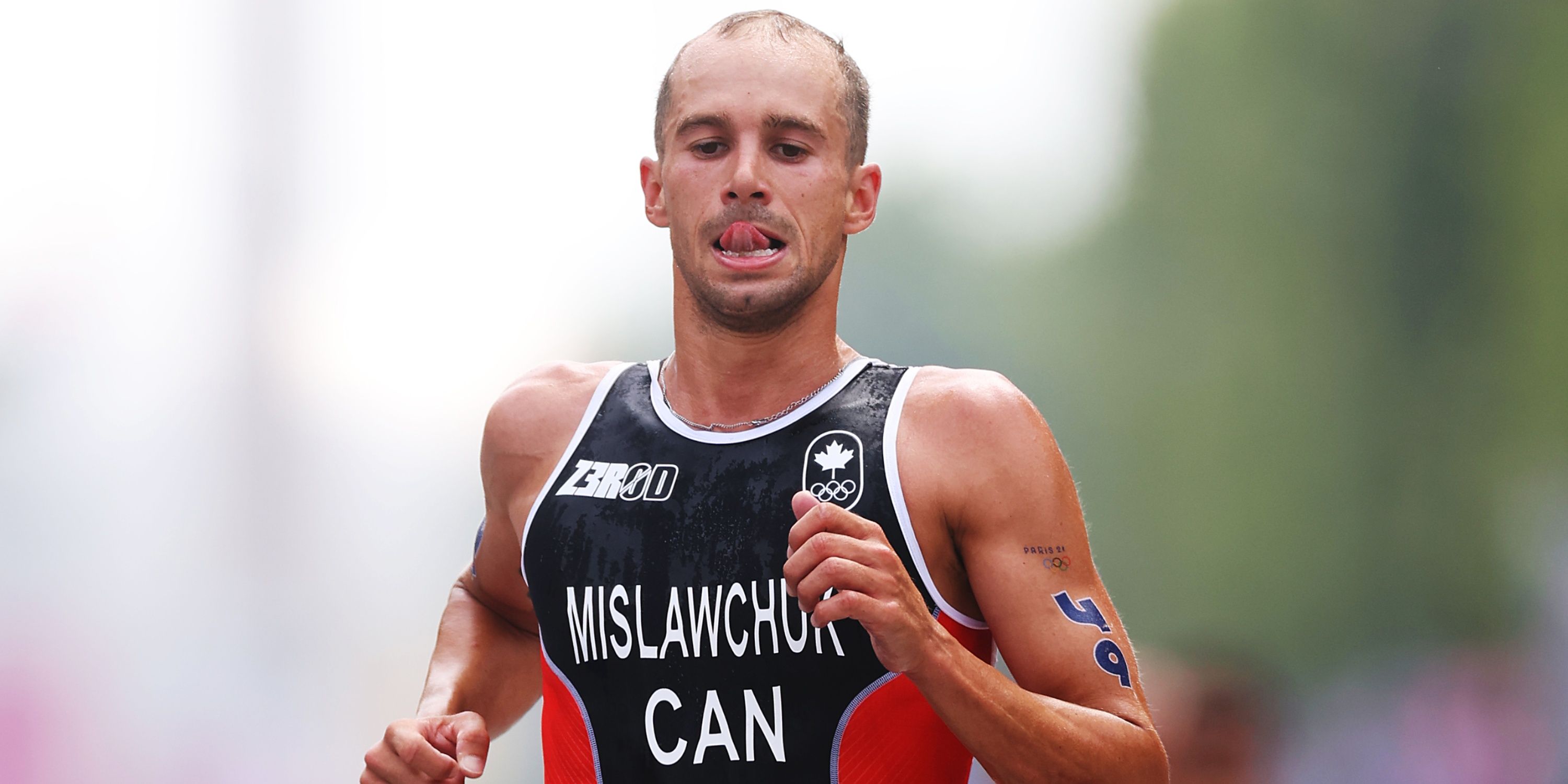Olympic Triathlete Vomits After Swimming in River Seine