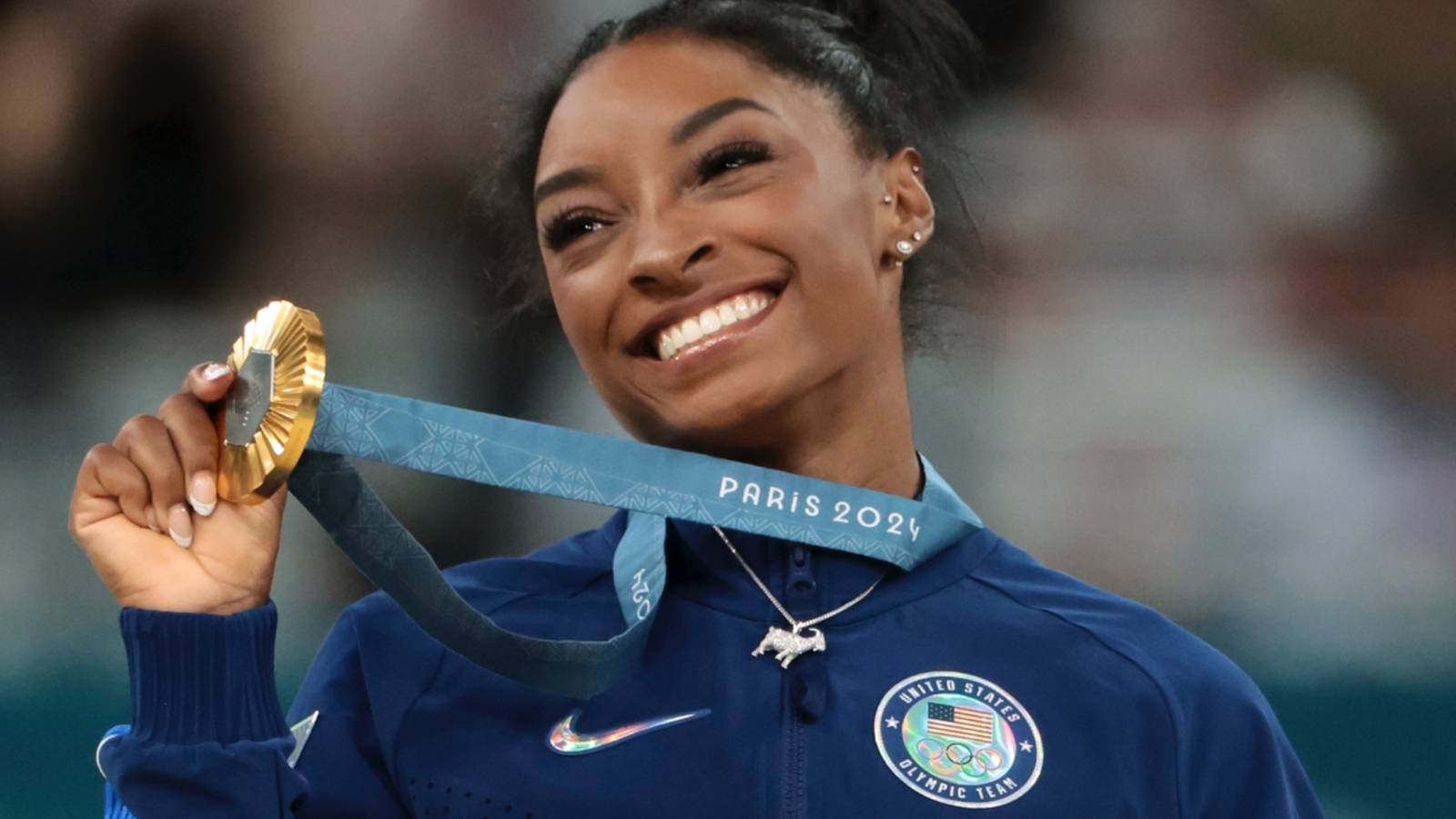 Why Simone Biles is Wearing 546-diamond GOAT Necklace at Olympics