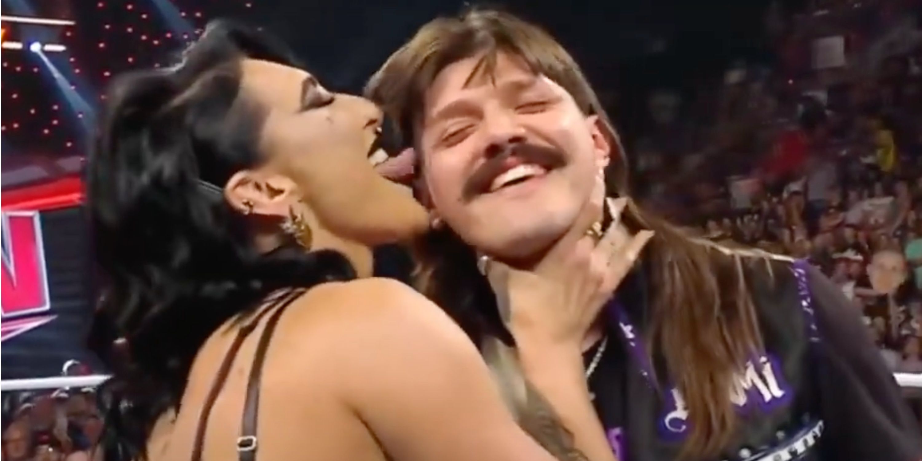 The Text Message Dom Mysterio's Wife Sent Him After Rhea Ripley Licked His Face